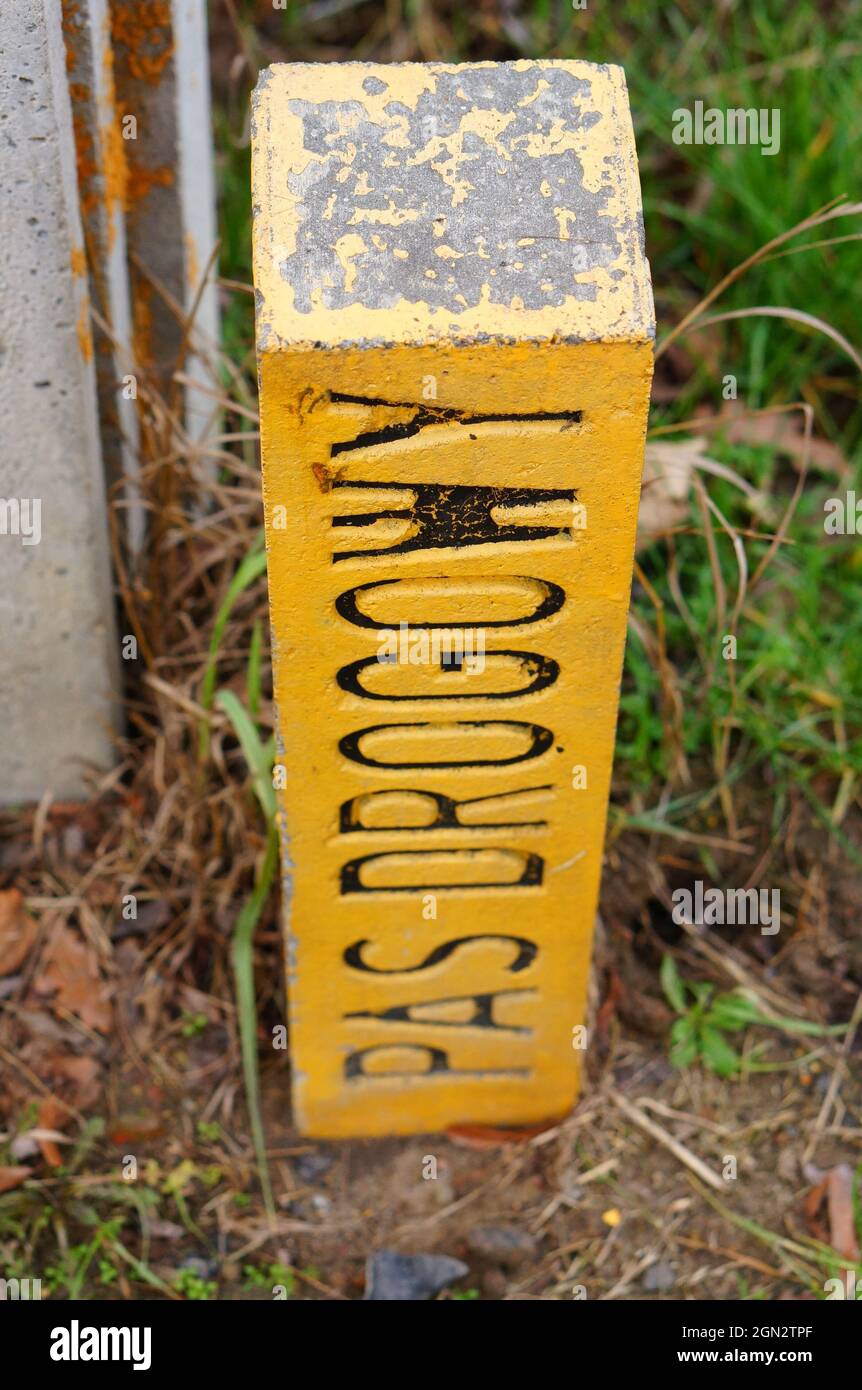 Path pole with Polish text Pas Drogowy meaning Lane Stock Photo - Alamy