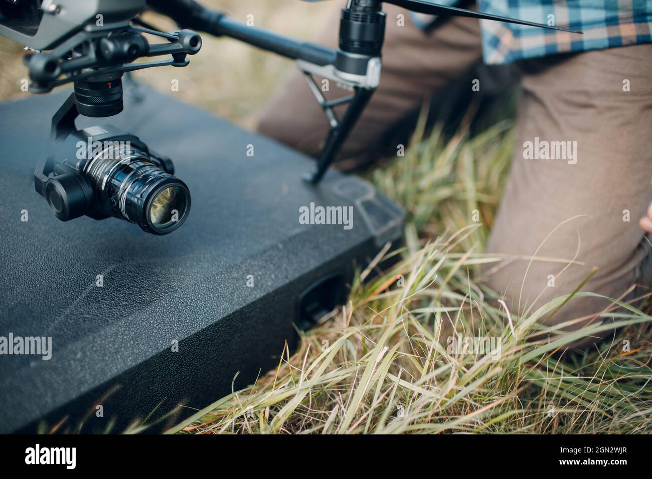 Big quadcopter drone camera lens before aerial flight and filming top ...