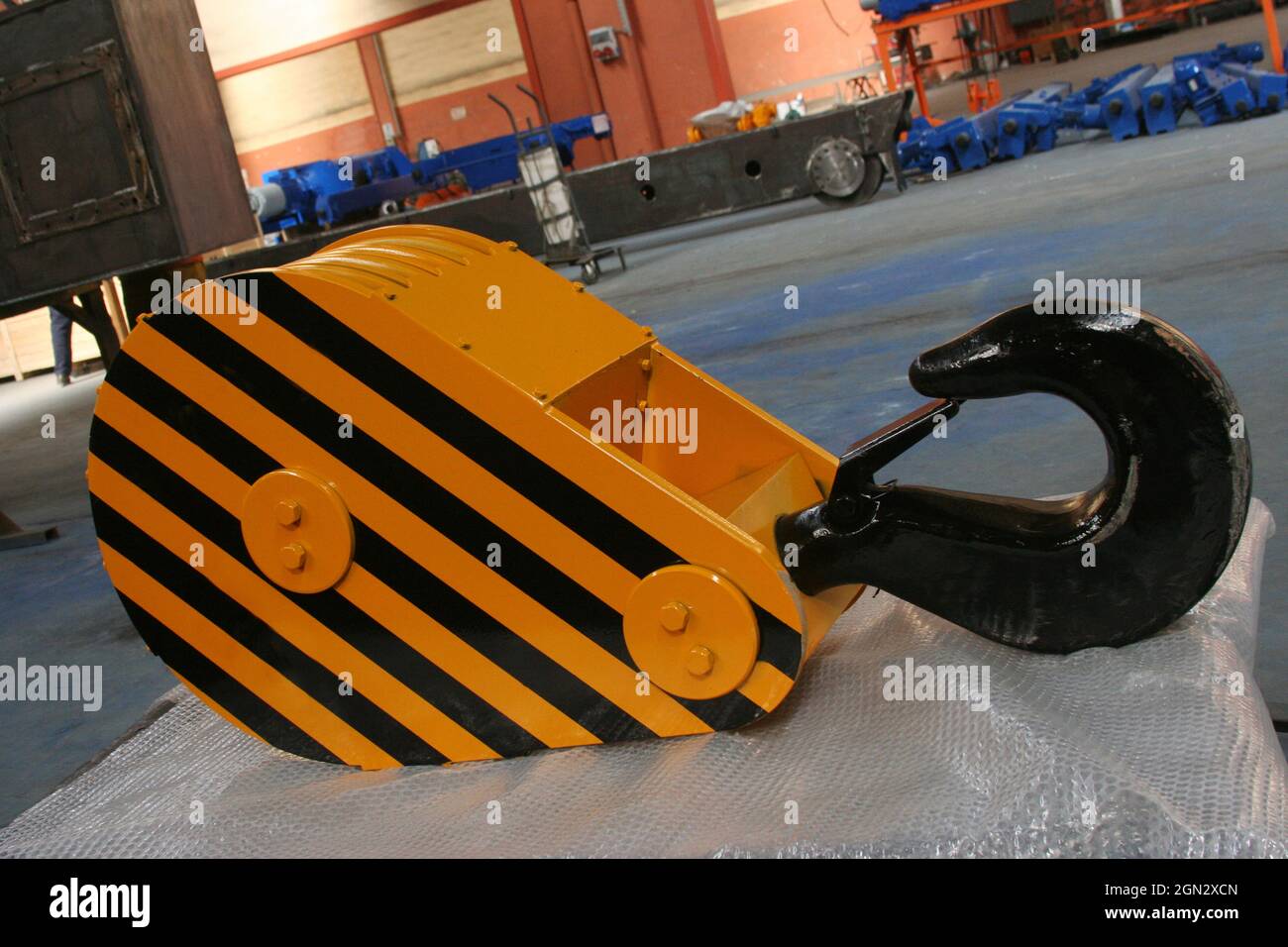 Powerful crane hook. Industrial background Stock Photo - Alamy