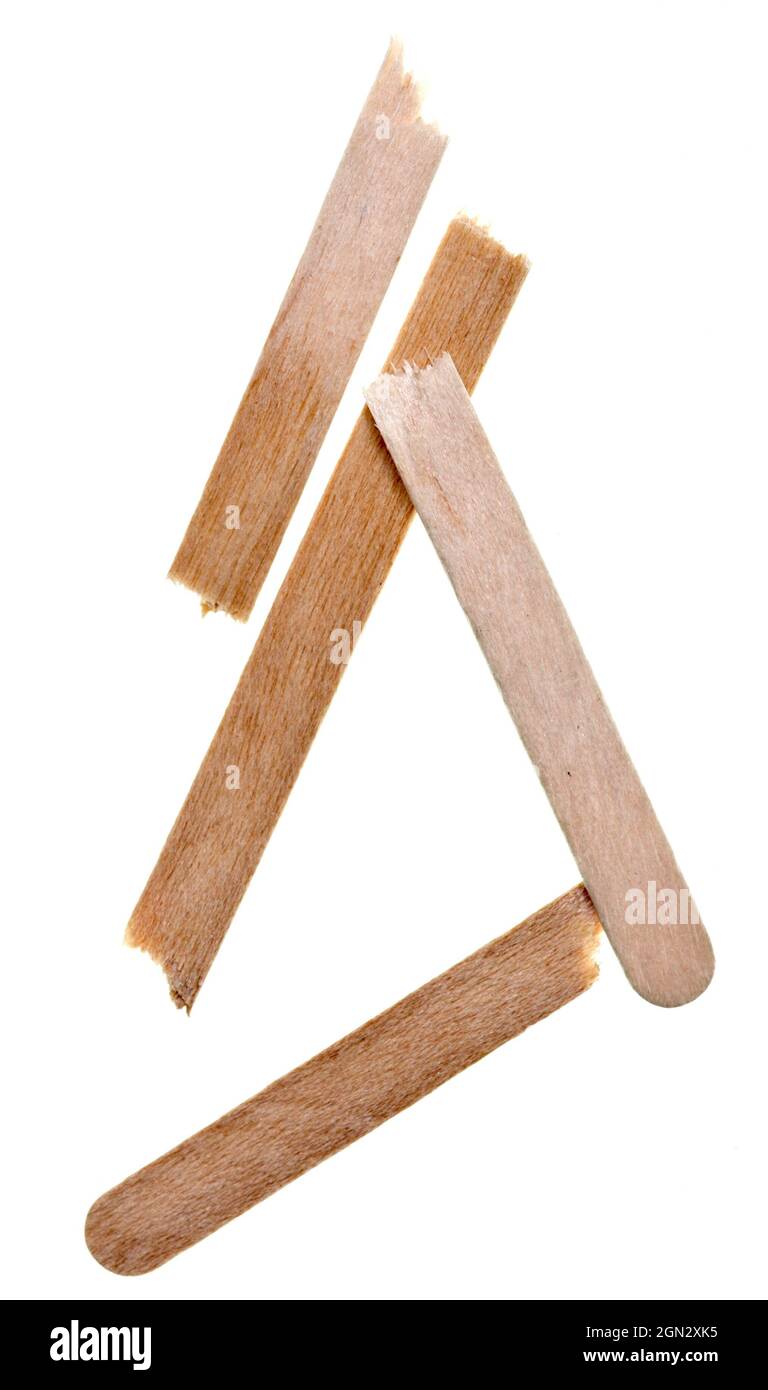 Broken sticks isolated on white background Stock Photo - Alamy