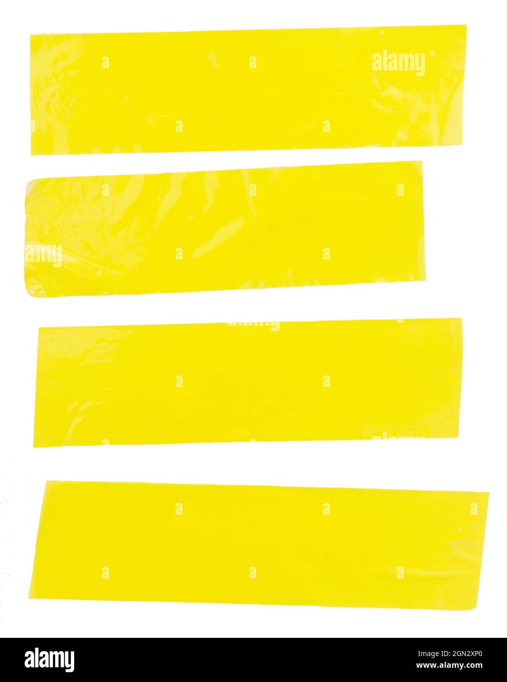 Yellow tapes isolated on white background Stock Photo - Alamy