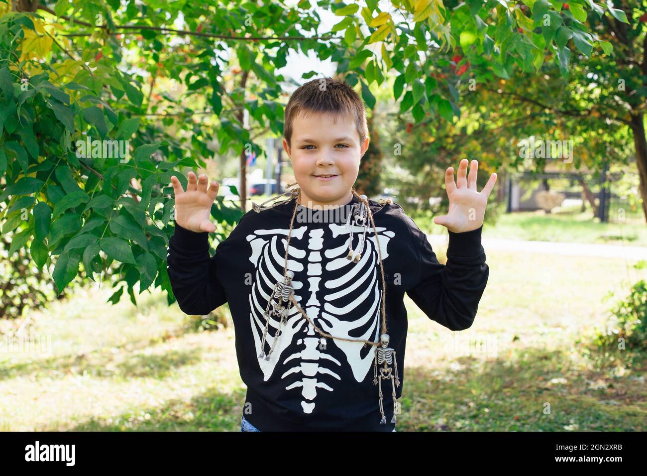 Little boy in a skeleton costume is ready to celebrate Halloween Stock ...