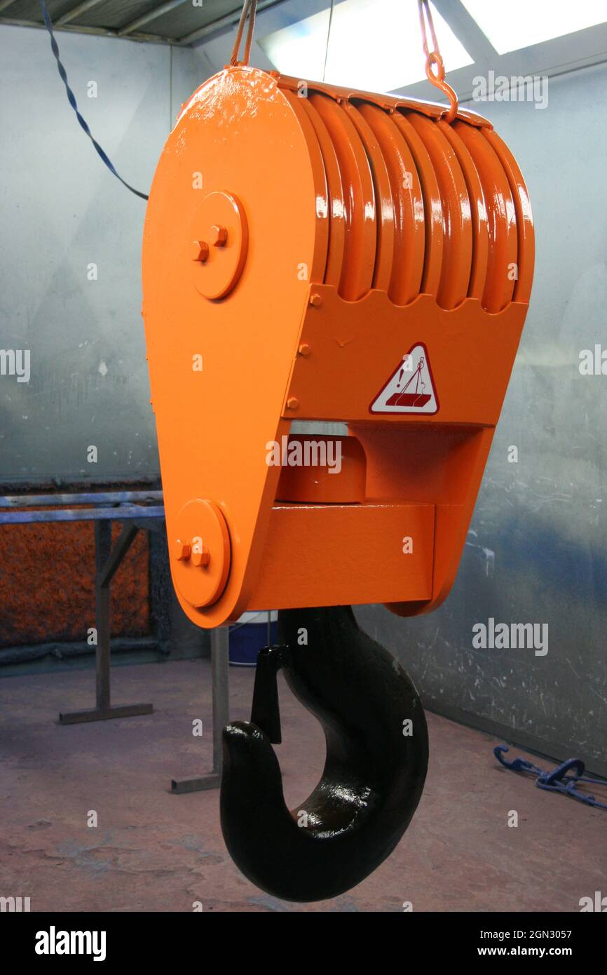Powerful crane hook. Industrial background Stock Photo - Alamy