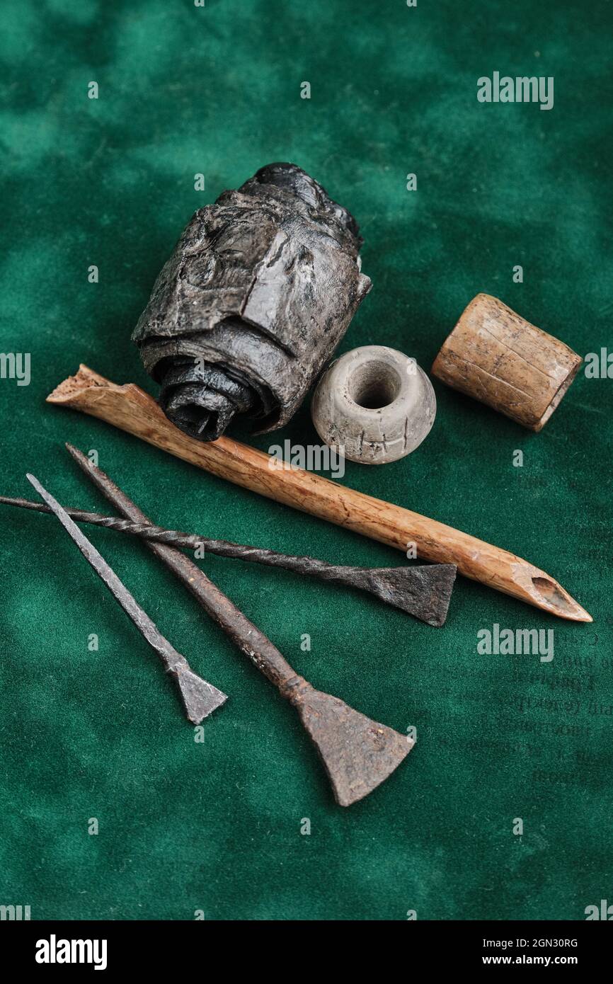 Ancient writing. Iron and bone stylos. Birch bark manuscript, clay ...