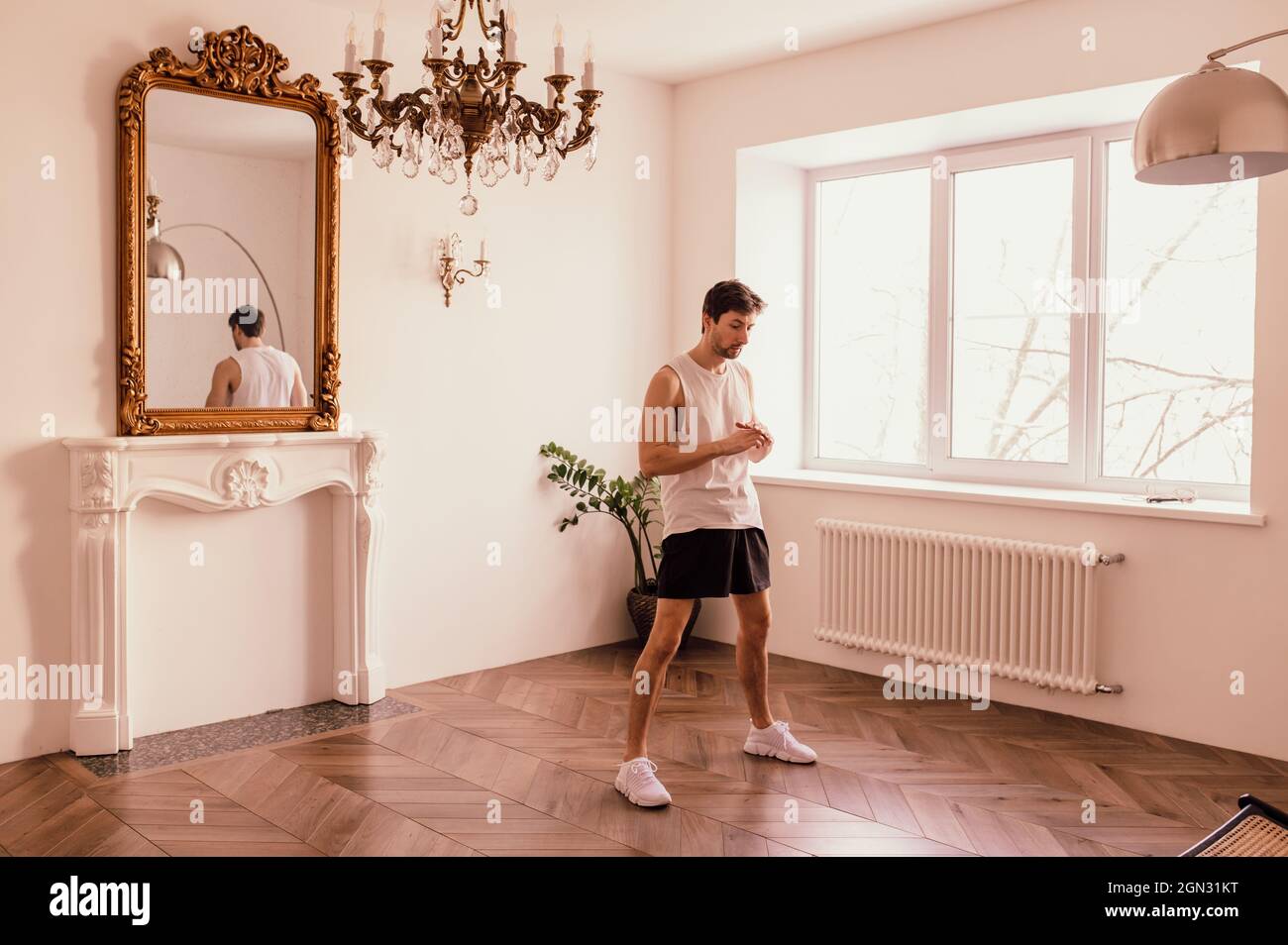 self-isolation man goes in for sports at home Stock Photo - Alamy