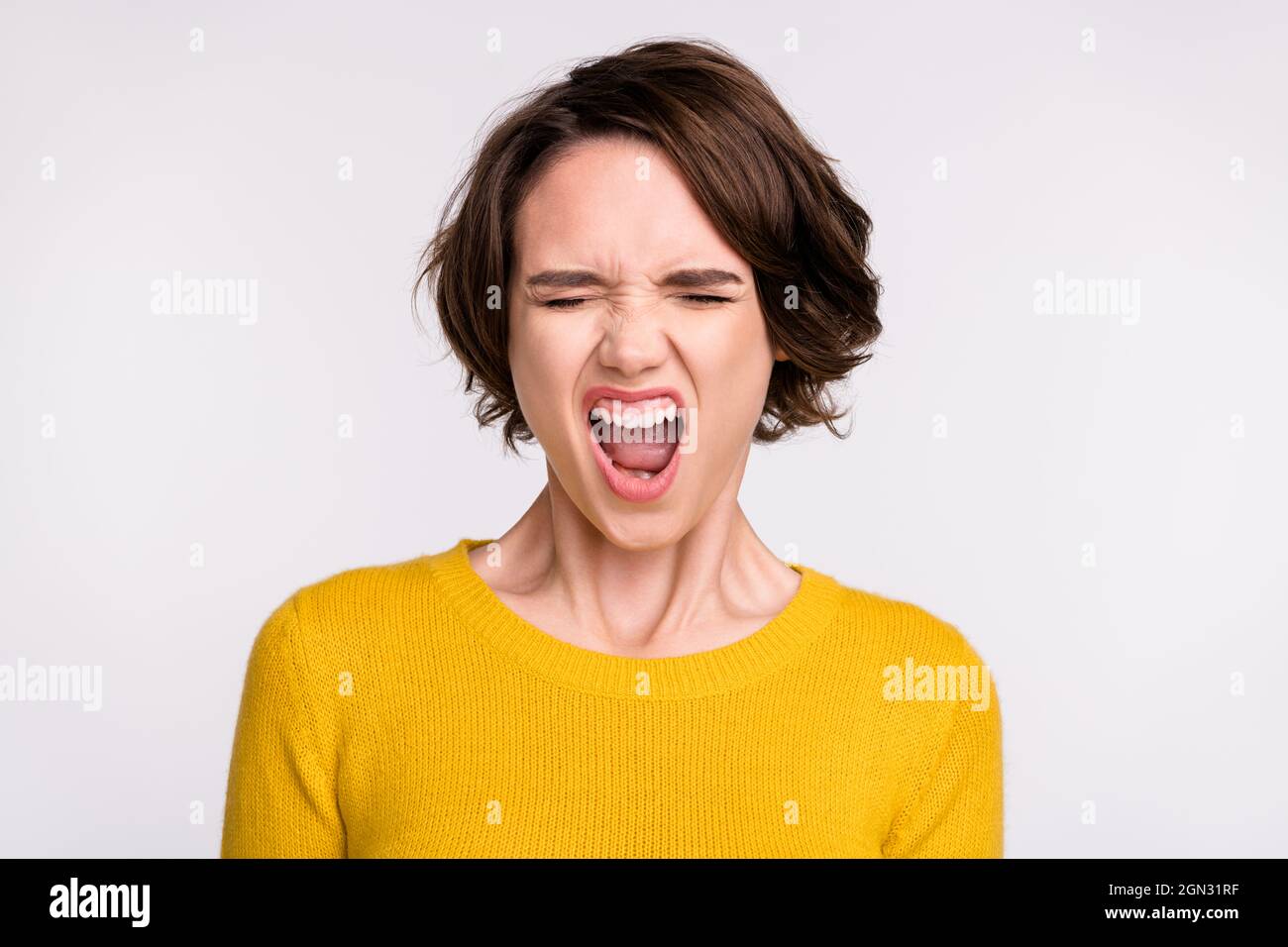 Photo of aggressive girl close eyes scream open mouth wear yellow shirt ...