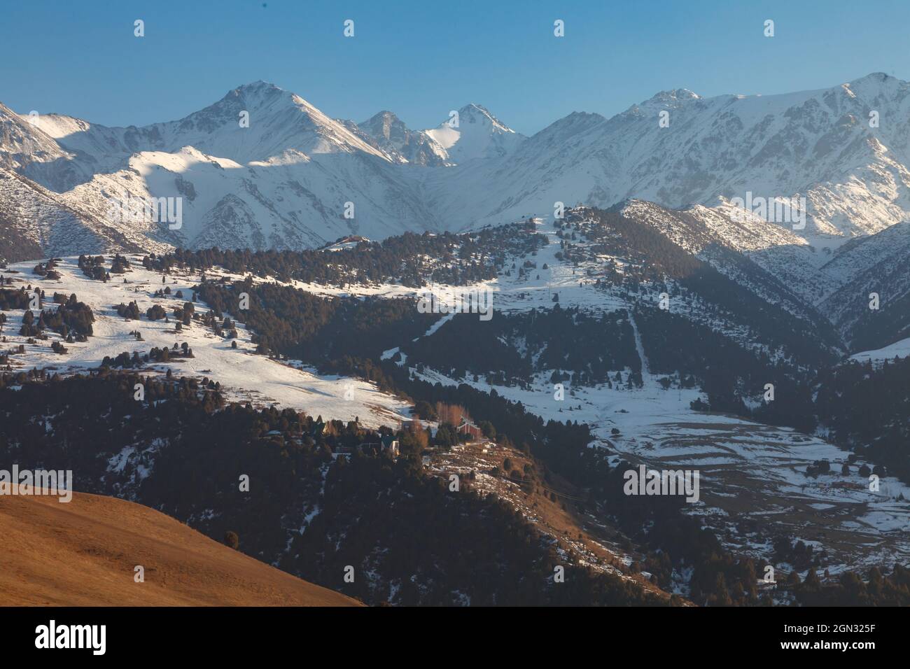 Panorama of the mountains: The Tien Shan Mountains in the evening before sunset Stock Photo - Alamy