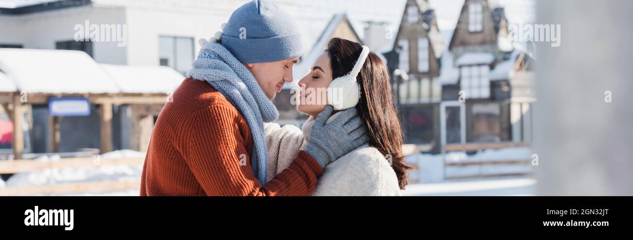 side view of couple kissing near ice rink, banner Stock Photo - Alamy
