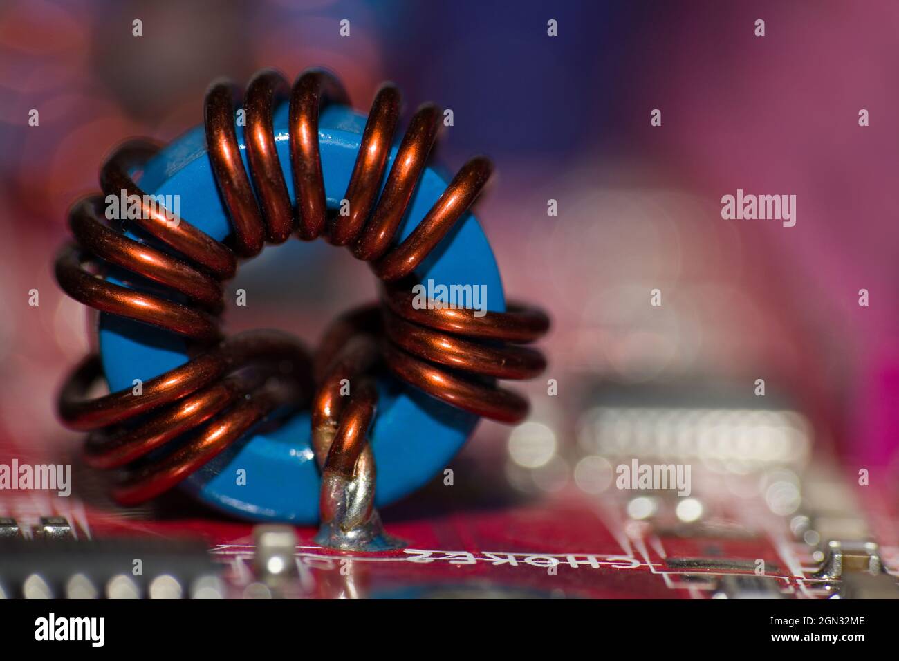 Close up of inductor copper coil on circuit board Stock Photo - Alamy