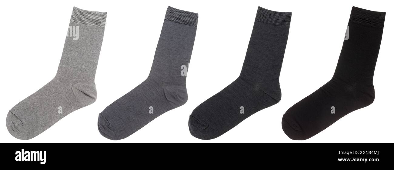 Four cotton socks of various shades isolated on a white background ...