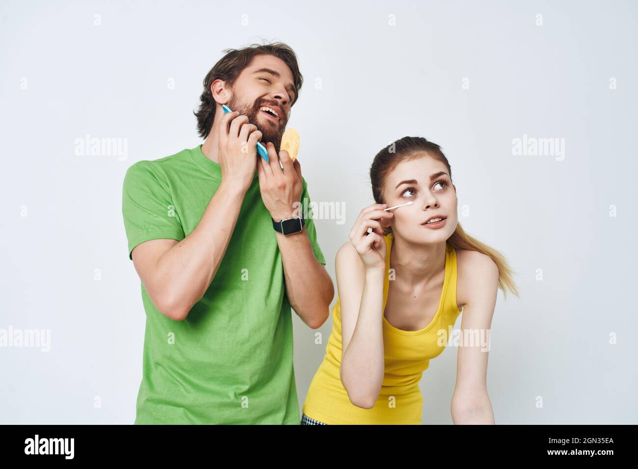 man and woman skin care morning procedures Stock Photo - Alamy