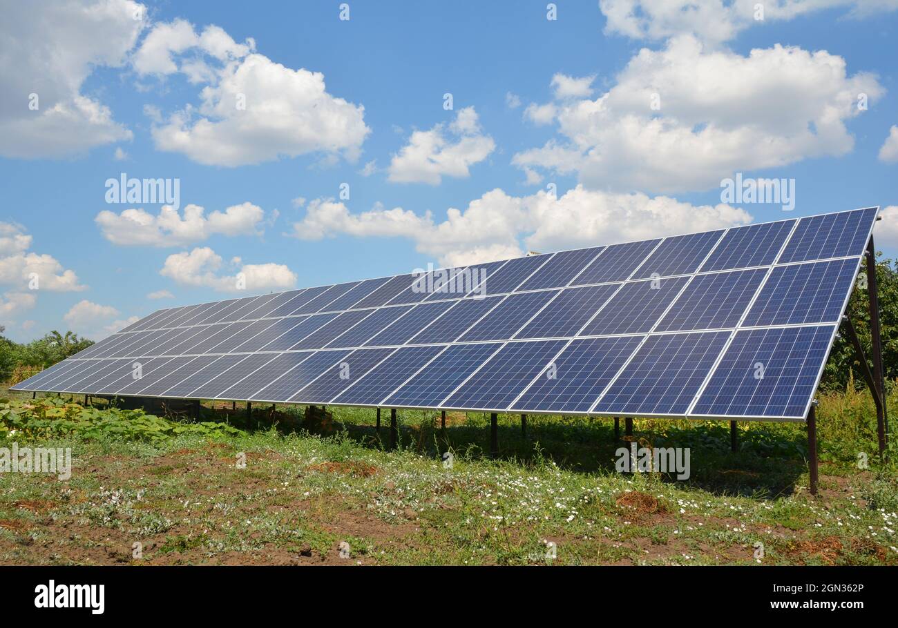 Solar panels installed on the ground. Solar energy concept Stock Photo ...