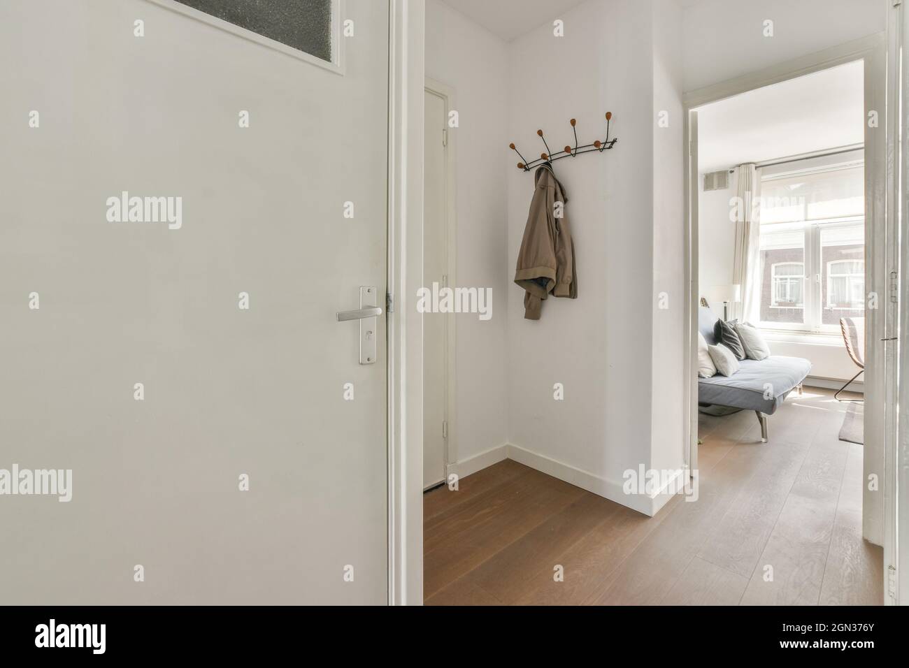 Interior of empty light hallway with minimalistic design in modern ...