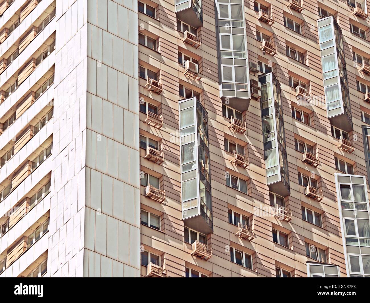 Detail of a modern high-rise apartment building. Typical city ...