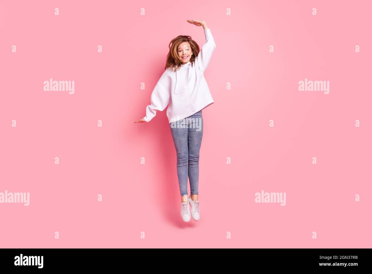 Full length body size back view girl jumping high showing height growth ...