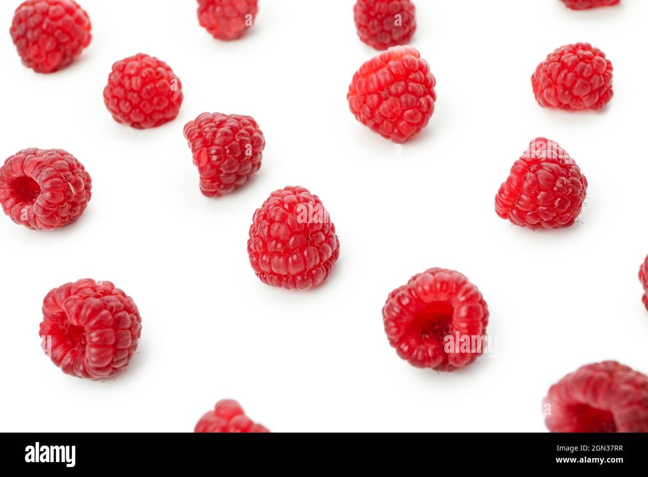 Flat lay composition with red juicy raspberry, isolated on white ...