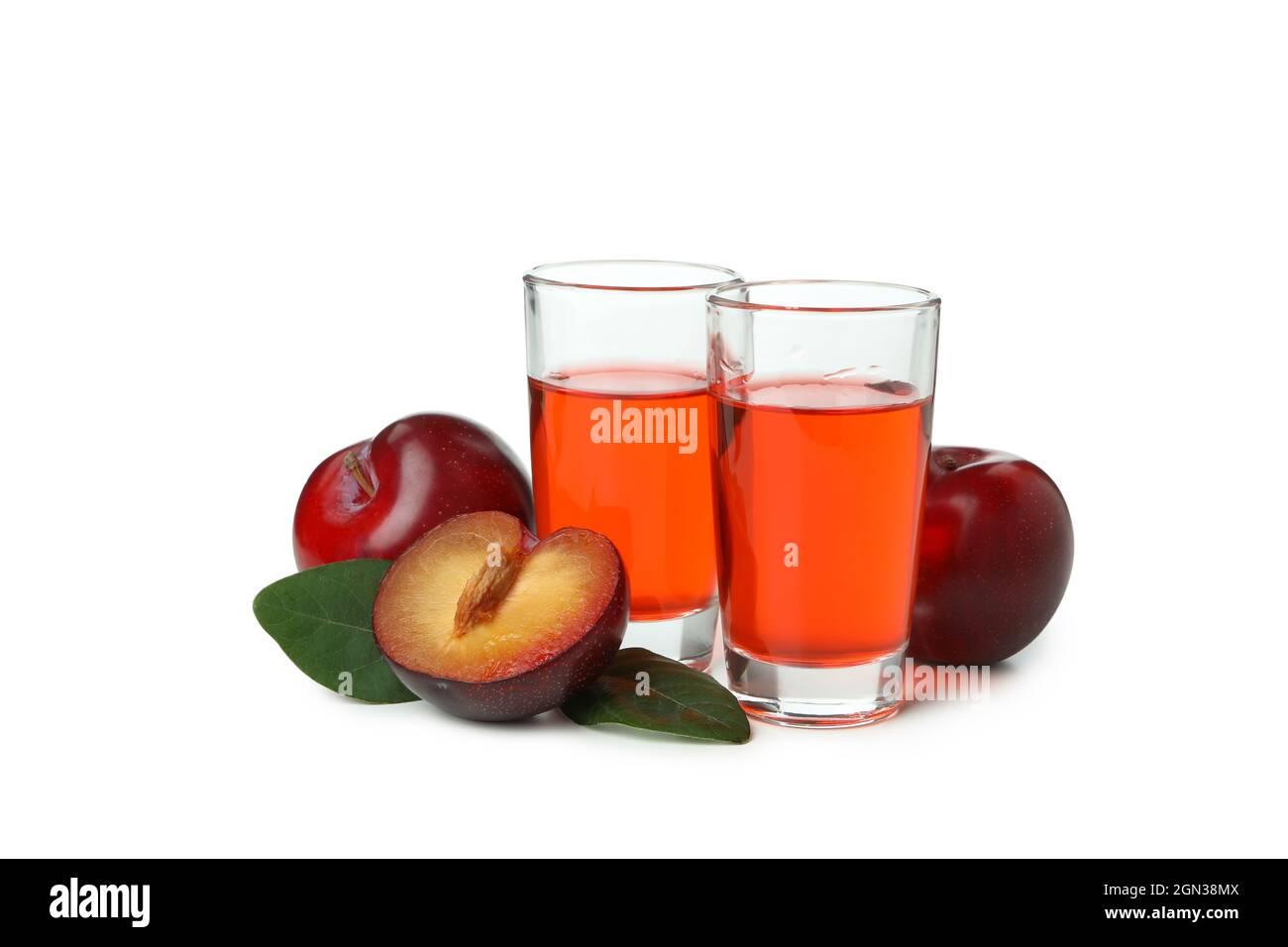 Plum brandy shots isolated on white background Stock Photo - Alamy