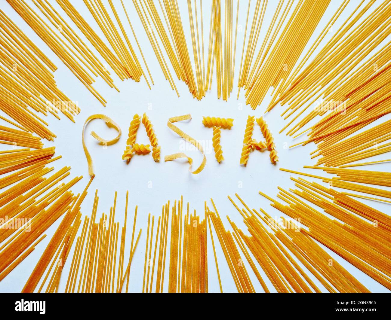 White background design of pasta written with spaghetti Stock Photo - Alamy