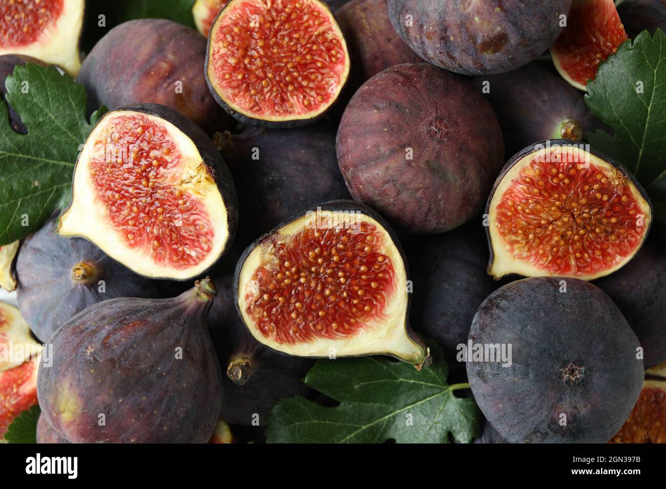 Ripe fig all over background, close up Stock Photo - Alamy