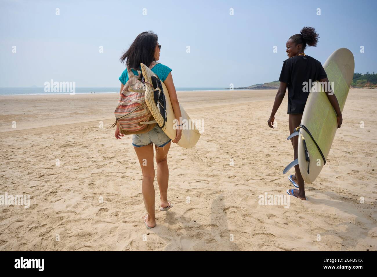 Back view surfers surfboards hi-res stock photography and images - Alamy