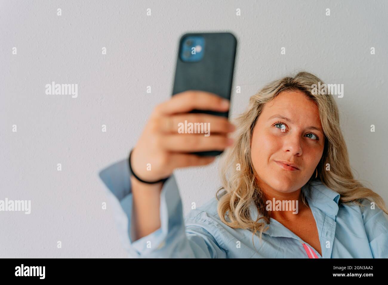 Female doctor wearing medical uniform and mask healing teeth with UV ...