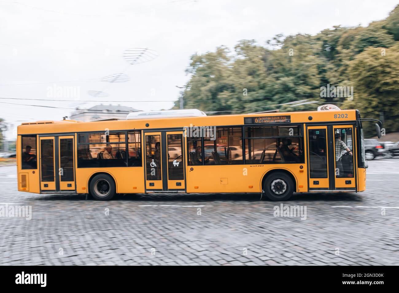 Ukraine, Kyiv - 2 June 2021: Yellow Municipal Public Bus moving on the ...