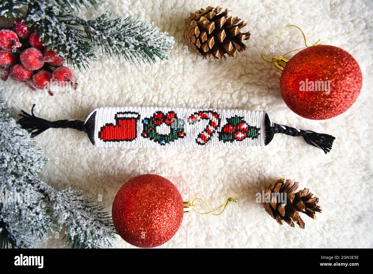 Woven friendship bracelet with pattern Christmas berry, lollipop ...
