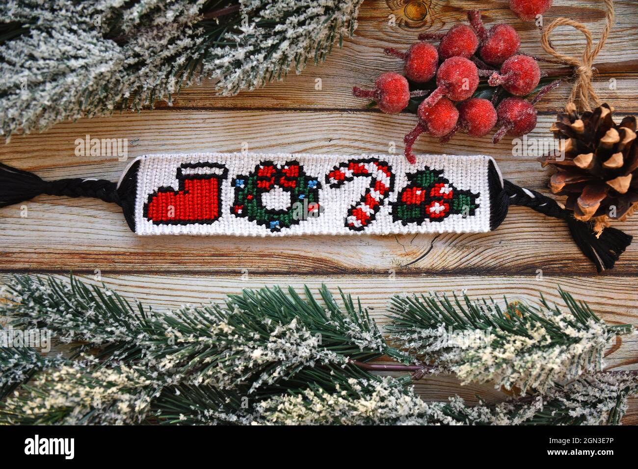 Woven friendship bracelet with pattern Christmas berry, lollipop ...