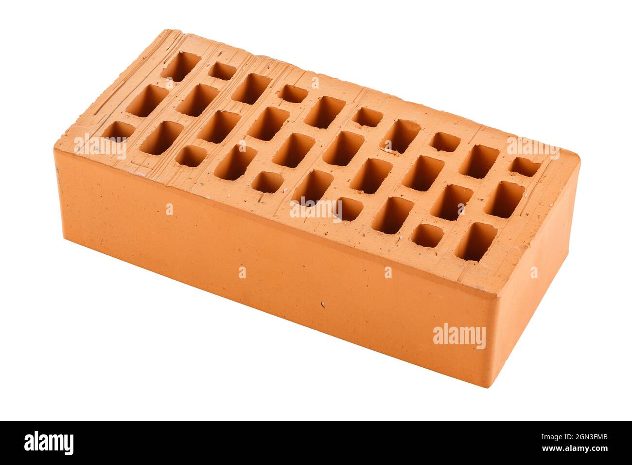 Perforated red brick isolated on white background Stock Photo - Alamy
