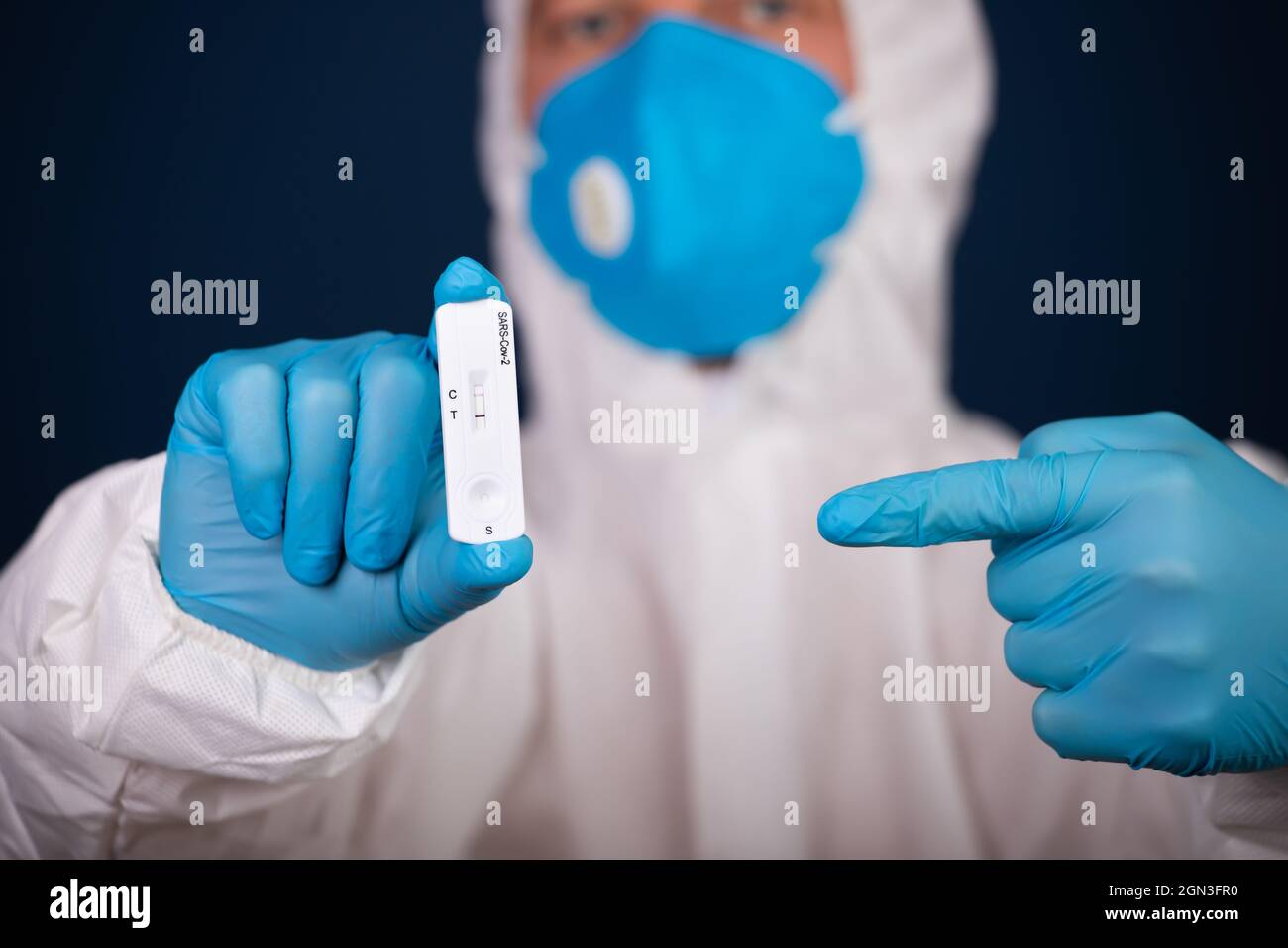 Doctor holding positive covid-19 ( rapid antigen SARS-CoV-2 Ag ) test ...