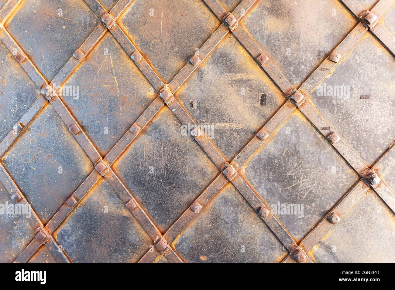 Rusty metal texture as background with streaks of rust. Old gate of ...