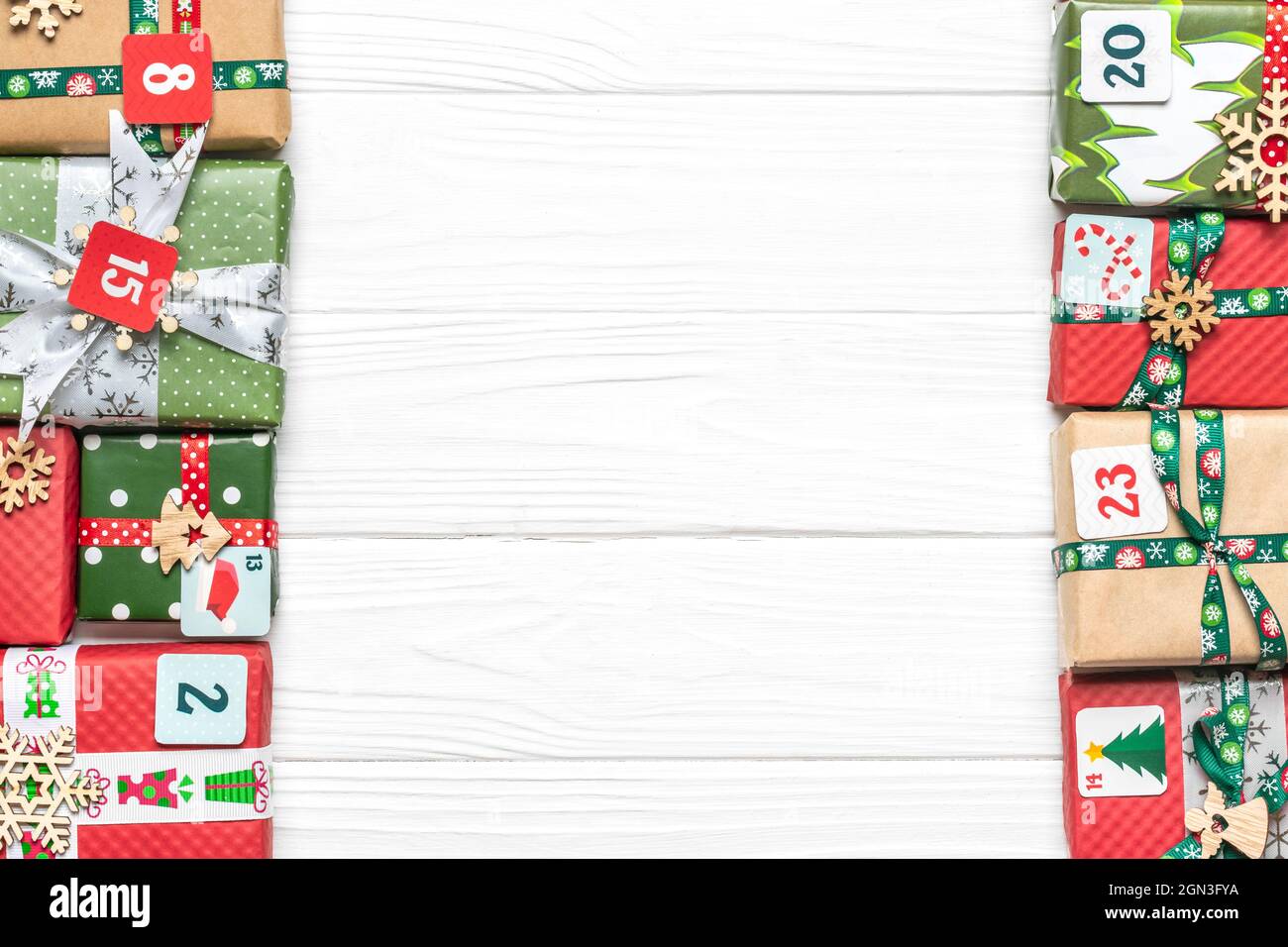 Handmade wrapped red, green gift boxes decorated with ribbons ...