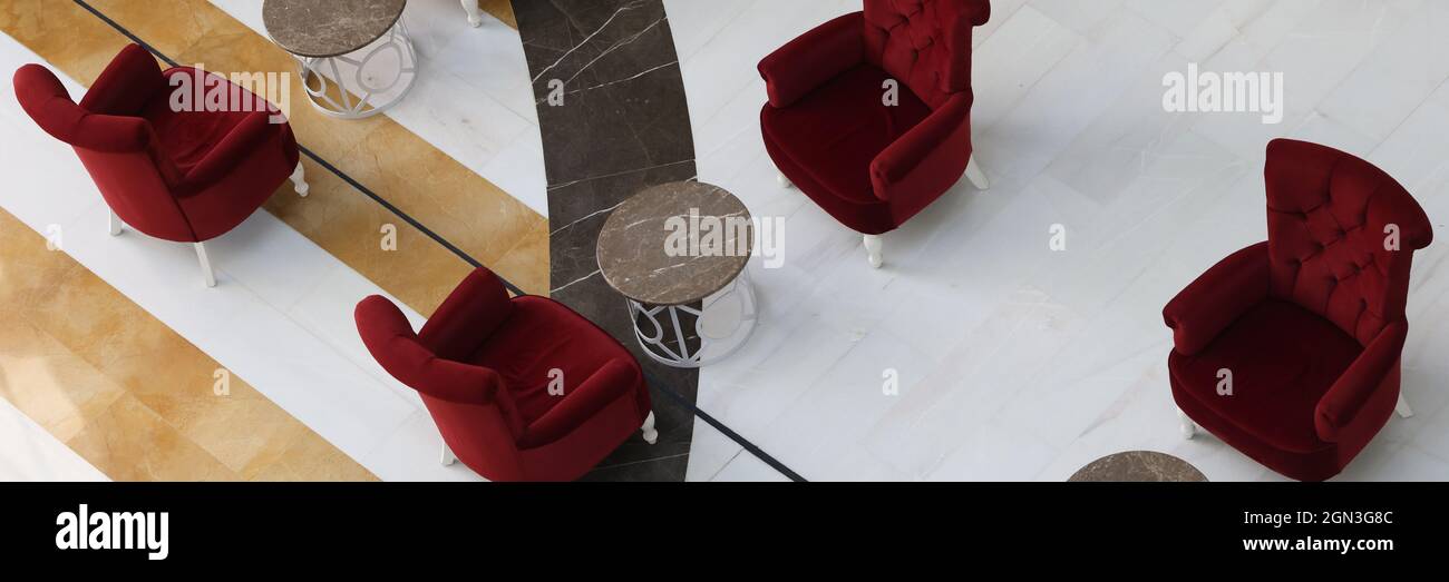 Red chairs and small tables standing in large hall top view Stock Photo ...