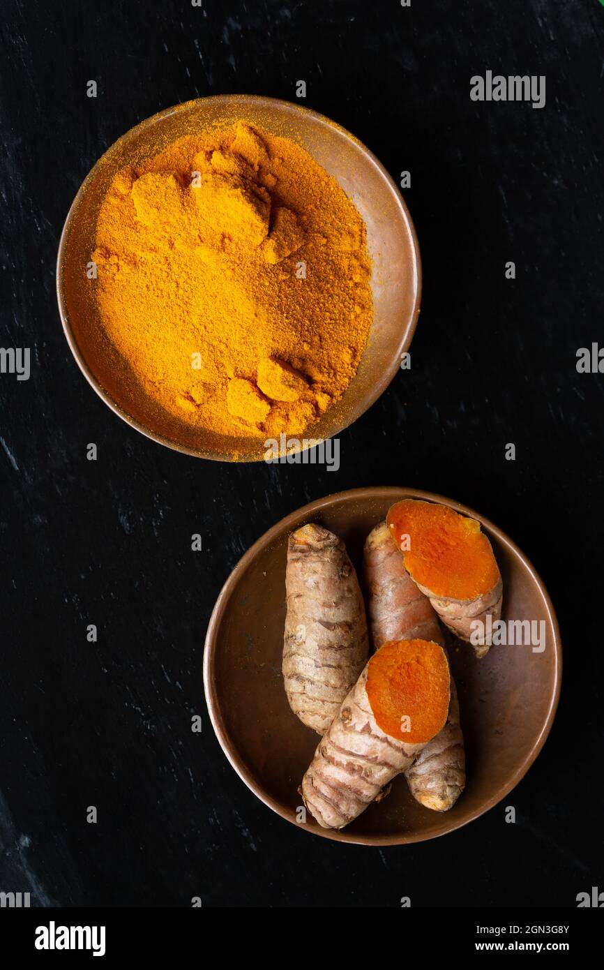 Turmeric roots and powder hi-res stock photography and images - Alamy