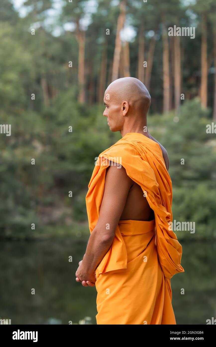 Buddhist man meditating hi-res stock photography and images - Alamy