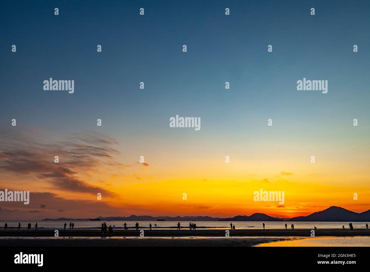 Sea under the sunset sky Stock Photo - Alamy
