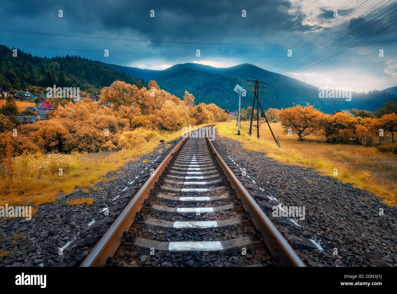 Rural railroad in mountains in overcast day. Old railway Stock Photo ...