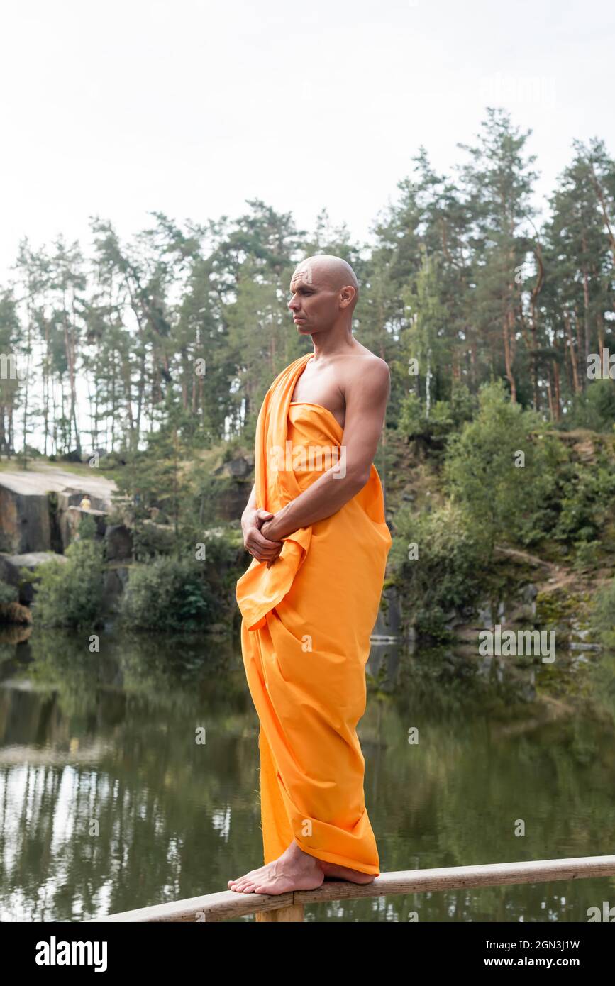 Buddhist monk standing meditating hi-res stock photography and images ...