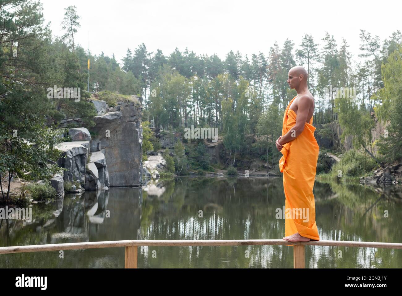 Buddhist monk standing meditating hi-res stock photography and images ...