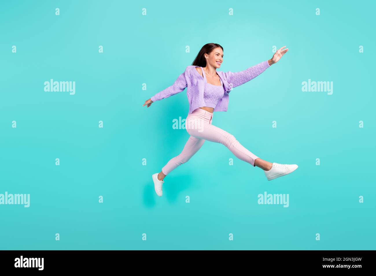 Photo of pretty charming young woman dressed purple clothes running ...