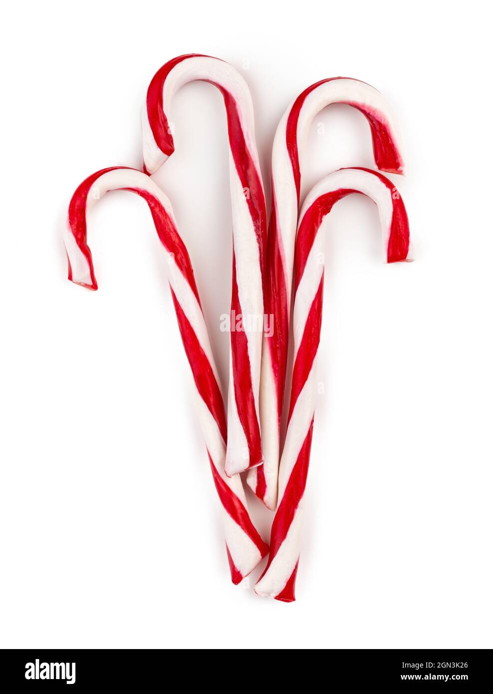 Stack of candy canes isolated on white background Stock Photo - Alamy