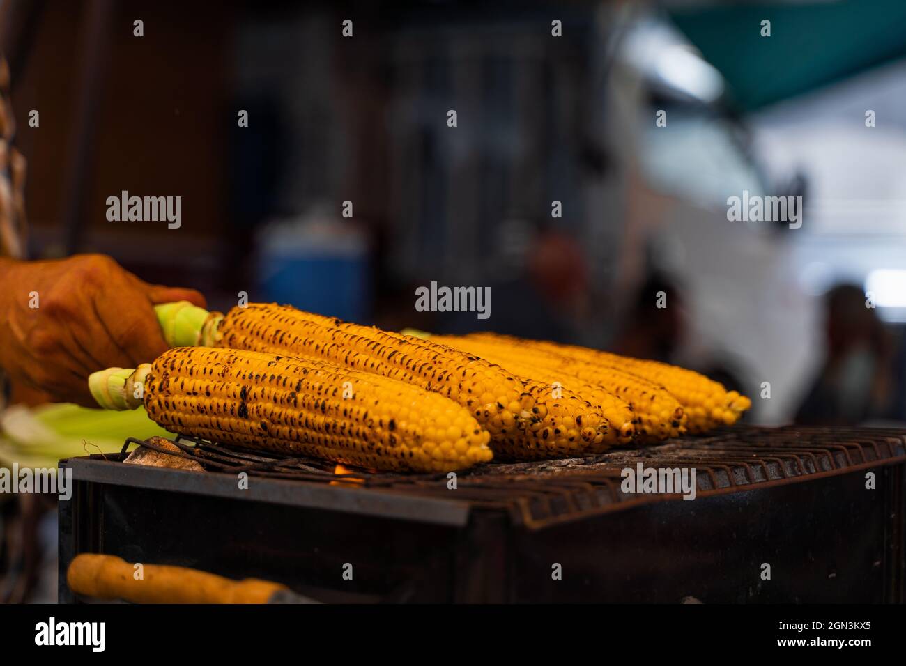 Fried corn on the grill on street. Healthy street food in Turkish ...