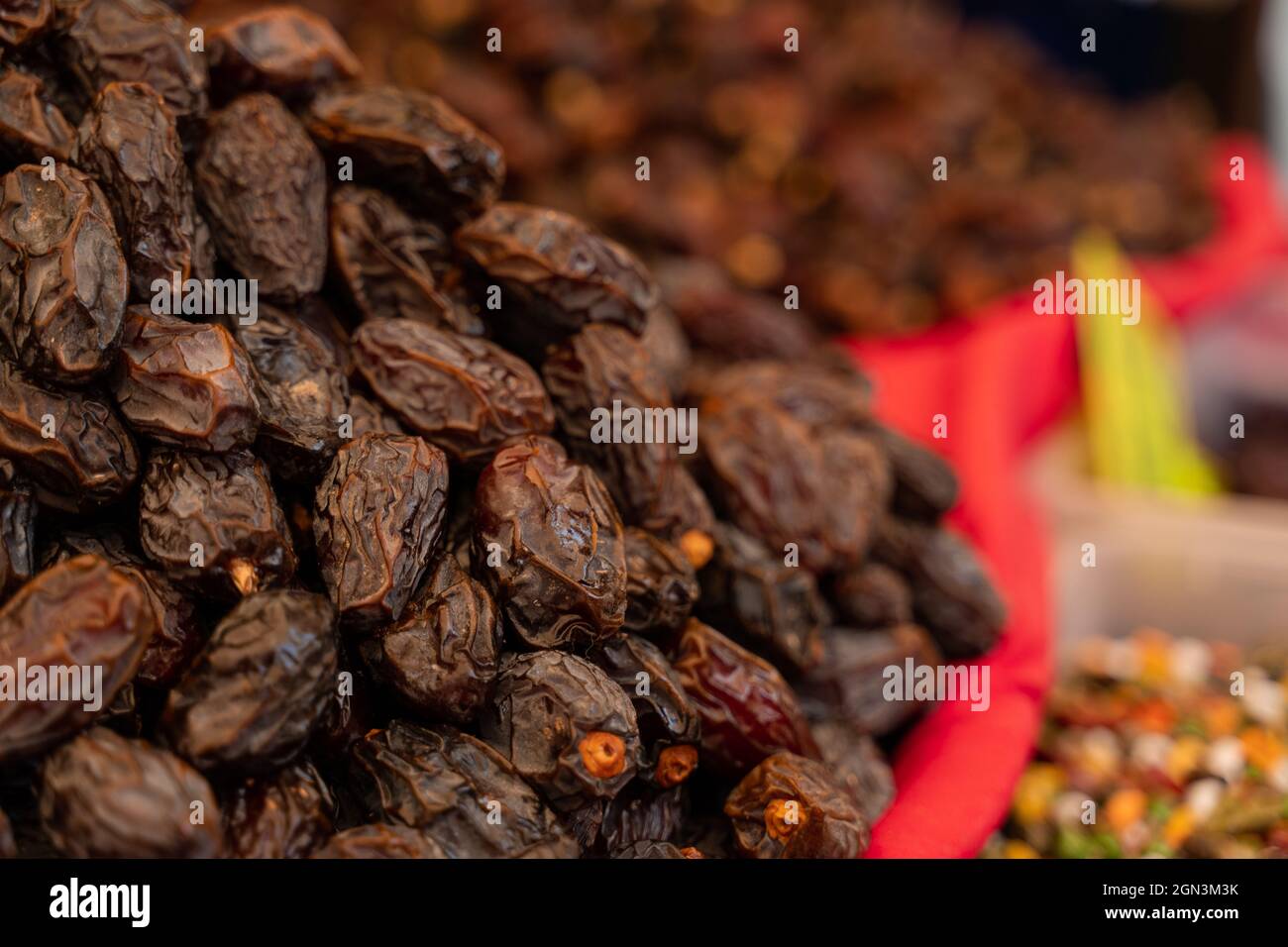 Dates on counter on Turkish market. Dried sweet dates Stock Photo - Alamy