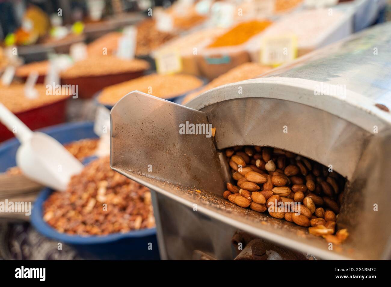 Roasting and blanching peanuts. Process of peeling peanuts in machine ...