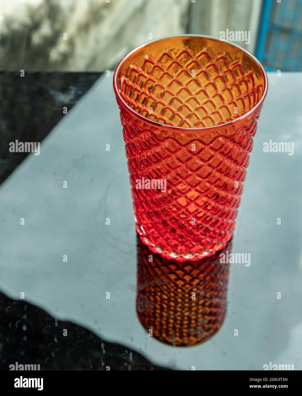 Colored transparent red glass cup for water drinking and surface ...