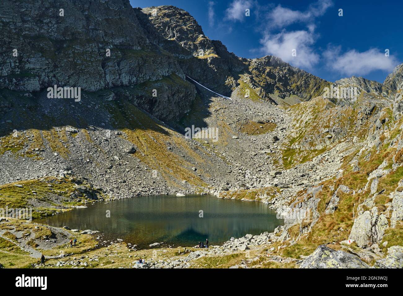 Landscape with the glacial lake Caltun in Fagaras mountain range ...