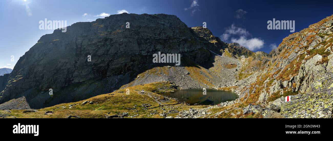 Landscape with the glacial lake Caltun in Fagaras mountain range ...