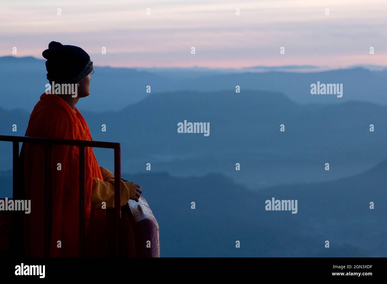 Buddhist monk on top of a mountain, in a mountain monastery Stock Photo ...