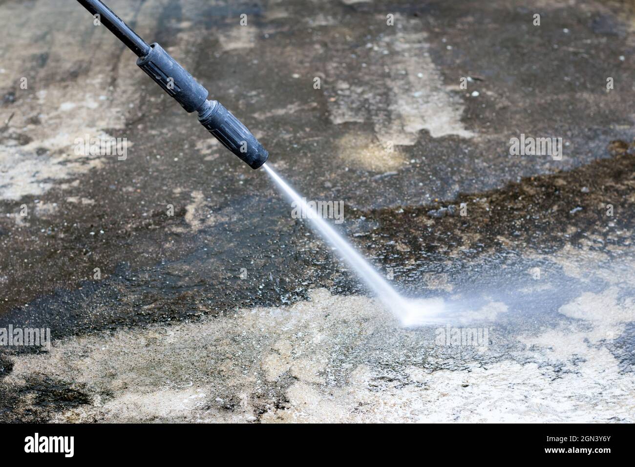 Outdoor floor cleaning with high pressure water jet Stock Photo - Alamy