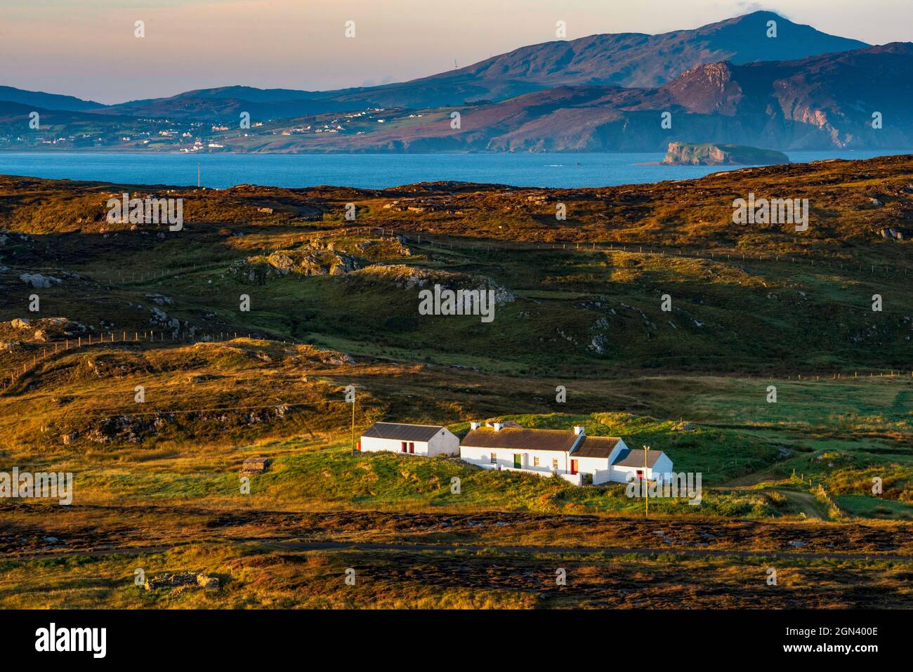 Traditional Irish Cottage in a Donegal landscape at Malin Head on ...